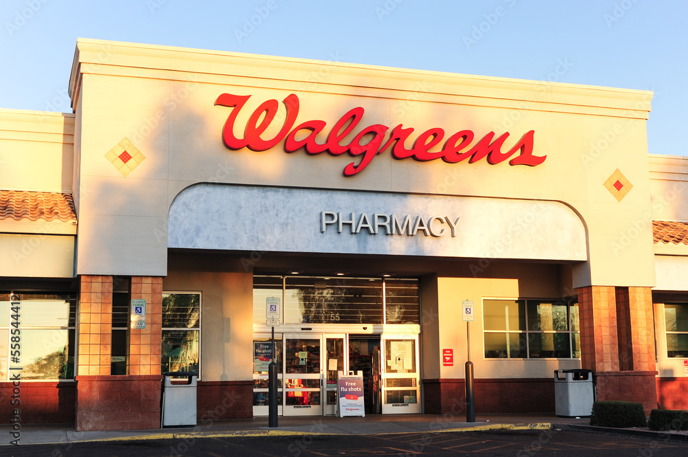 Storefront of a Walgreens Pharmacy building showing brand logo in ...