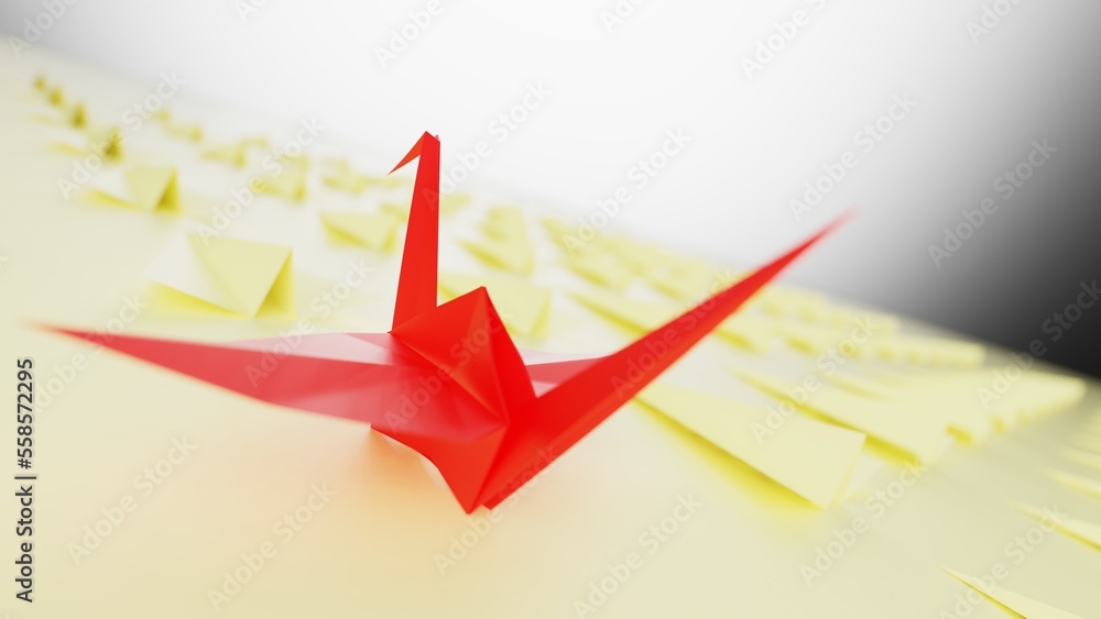 Origami of red crane and many yellow airplanes on soft blue board under ...