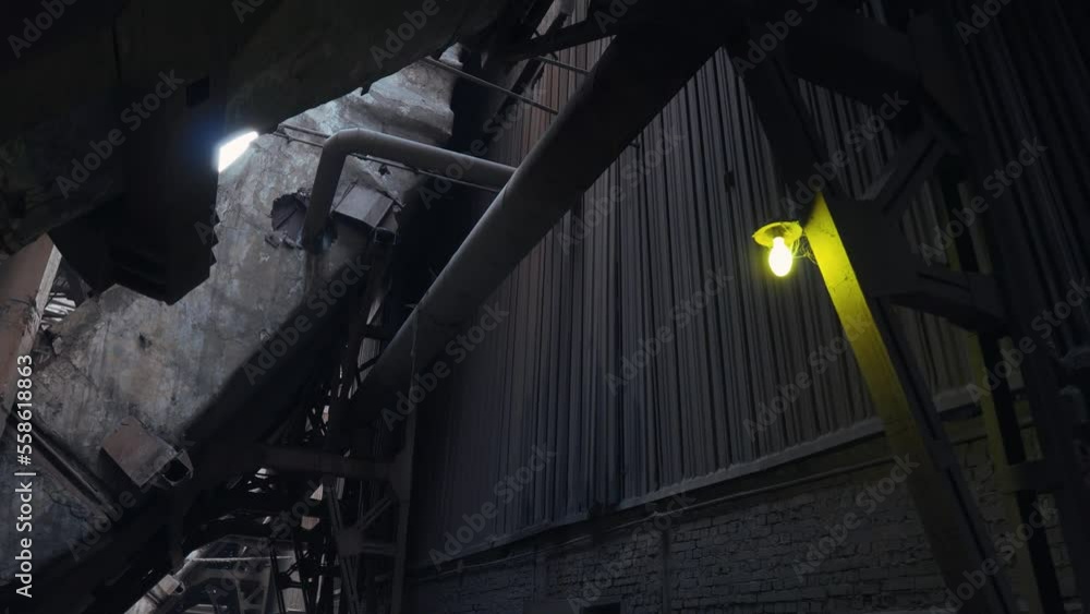 Gloomy dark scary corridor of an old abandoned factory. Metal rusty ...