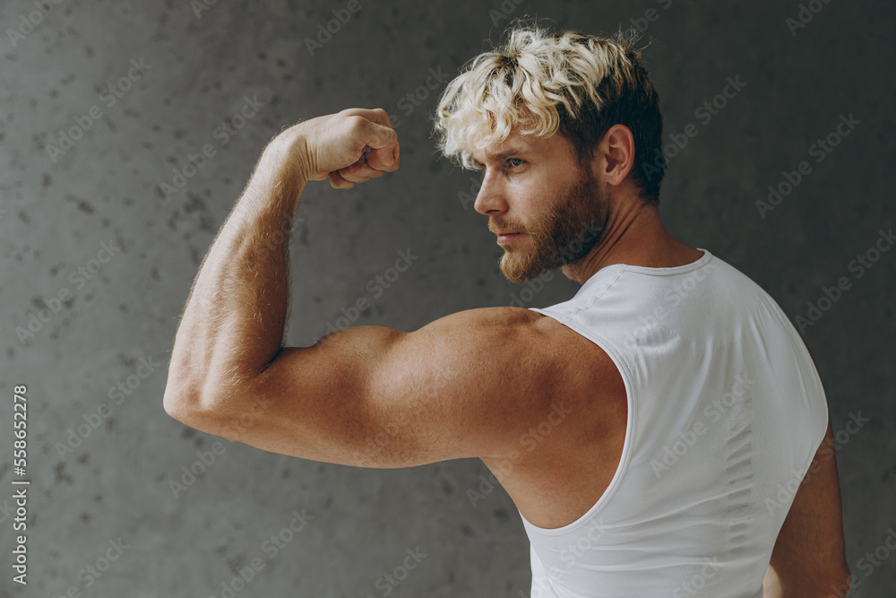 Back side view young calm strong sporty athletic sportsman man wear ...