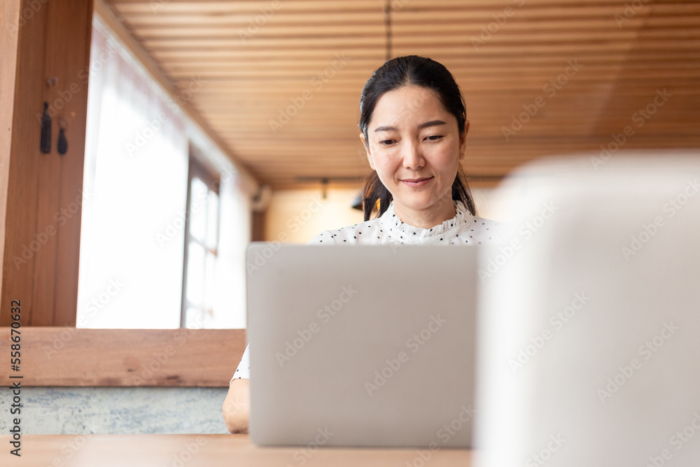 woman work using computer hand typing laptop keyboard contact us ...