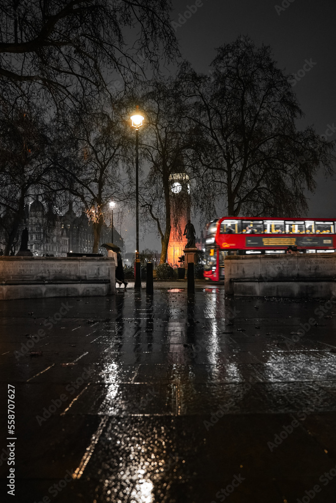 London in a rainy night. Big Ben clock tower landmark photographed in ...