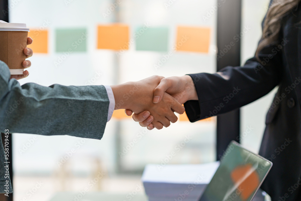 Business People standing, congratulating shaking hands confirming the ...