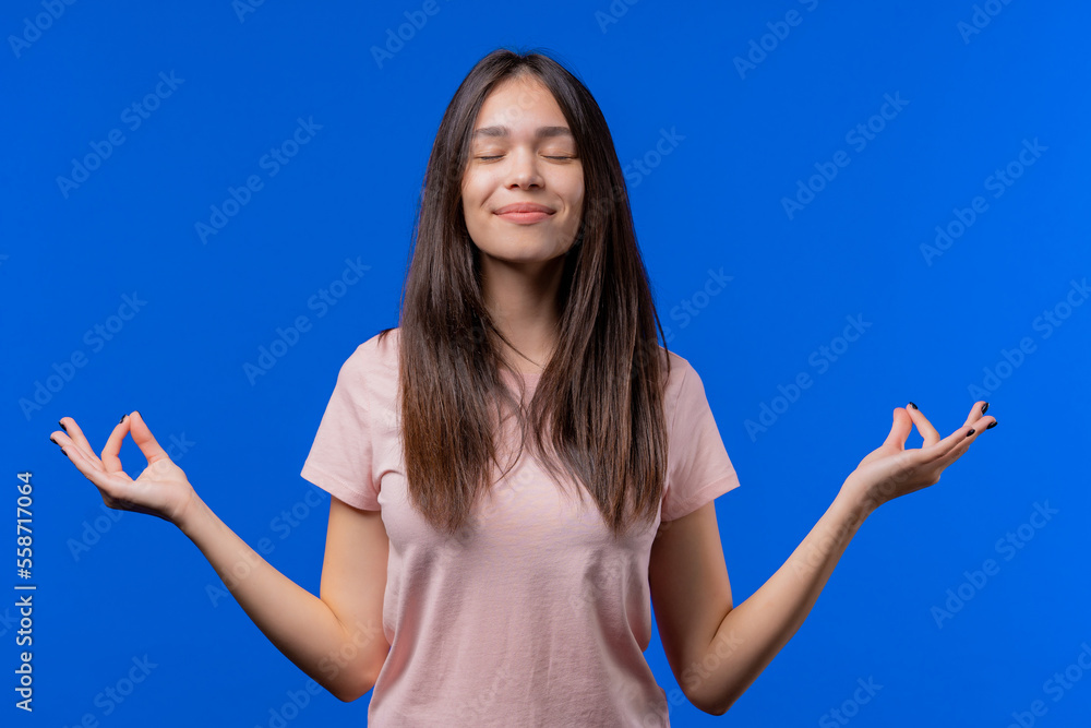 Calm woman relaxing, meditating, refuses stress. Young teen girl ...