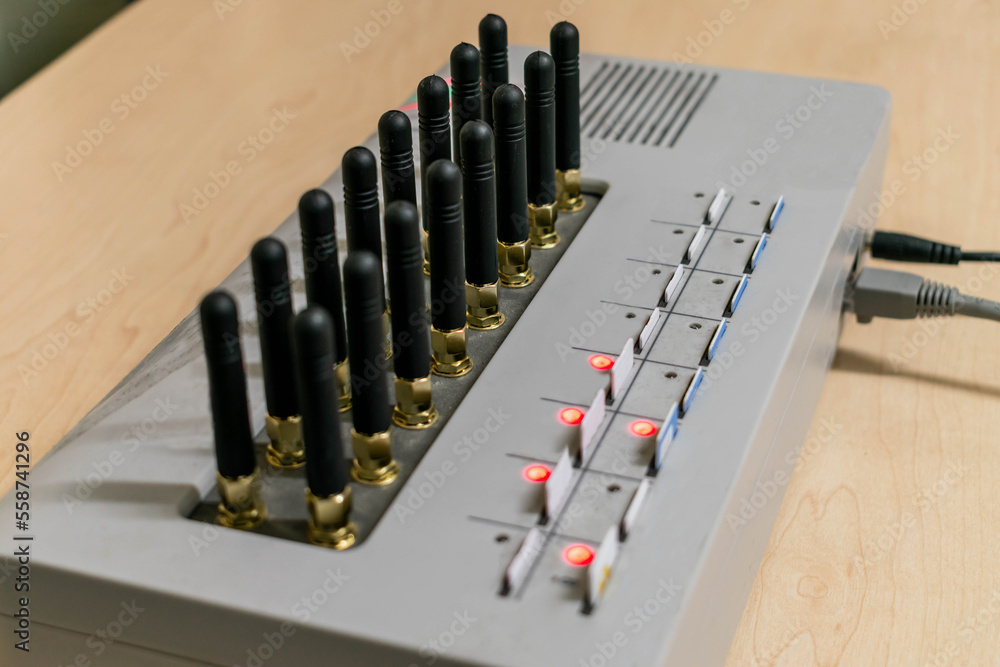 GSM gateway for ip telephony is a close-up. Many sim cards are inserted ...