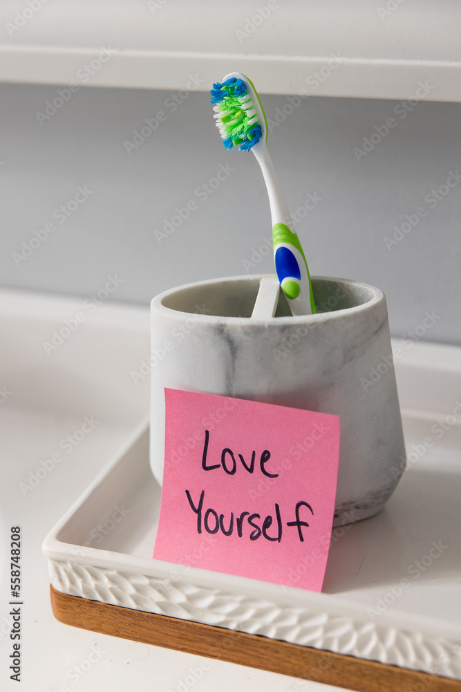 Love yourself post it note in bathroom, self love concept, love ... Love yourself post it note in bathroom, self love concept, love ...