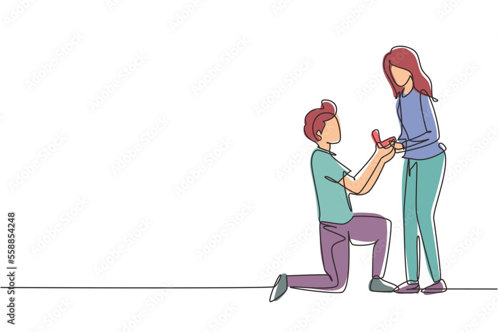 Continuous one line drawing man kneeling holding engagement ring ...