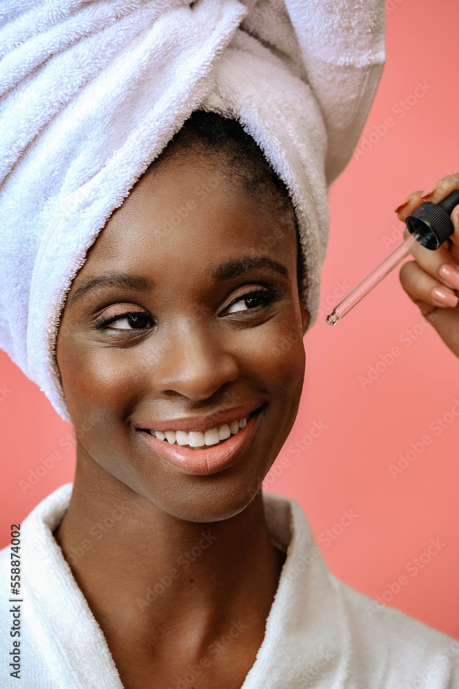 Face skin care. Woman smiling receiving oil serum treatment with ...