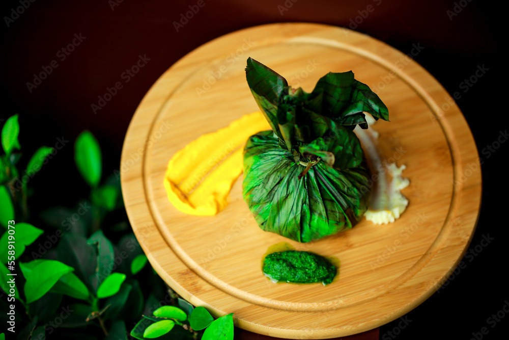 Kerala BEEF AND MUTTON KIZHI PARATHA MOR PORATTA IN BANANA LEAF ON A ...