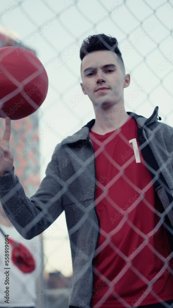 Vertical Screen: Portrait of a Handsome Young Football Player Looking ...