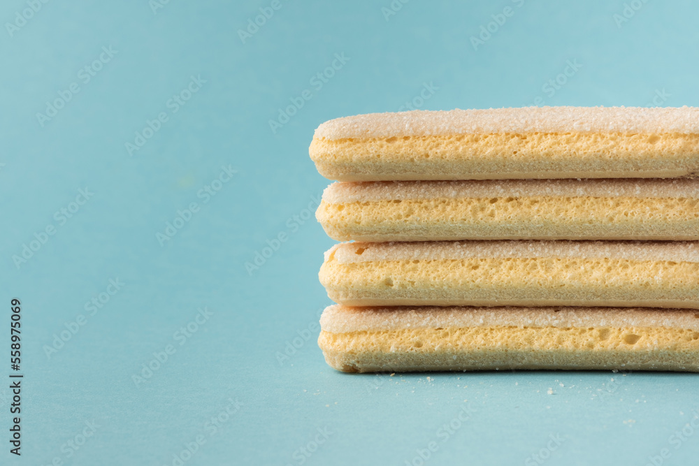 Traditional Italian savoiardi ladyfinger cookies stacked together on a ...