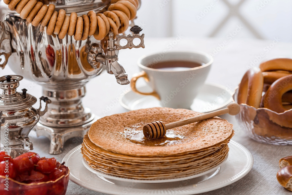 Russian traditions. Russian holiday Maslenitsa. Still life with a cup ...