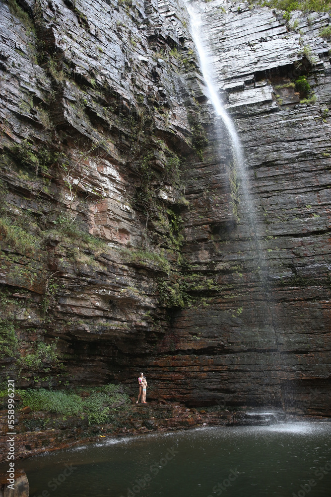 Dindefelo waterfall and tourist people, woman with child, kid. Kedougou ...