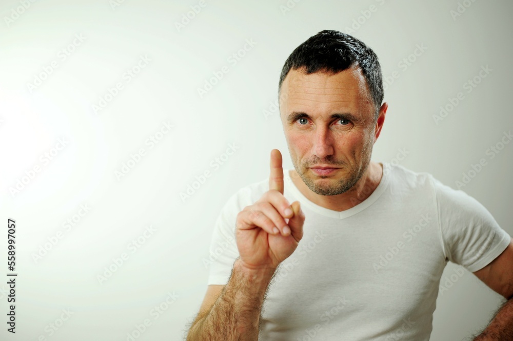 look here attention the man screwed up his eyes raised his index finger ...