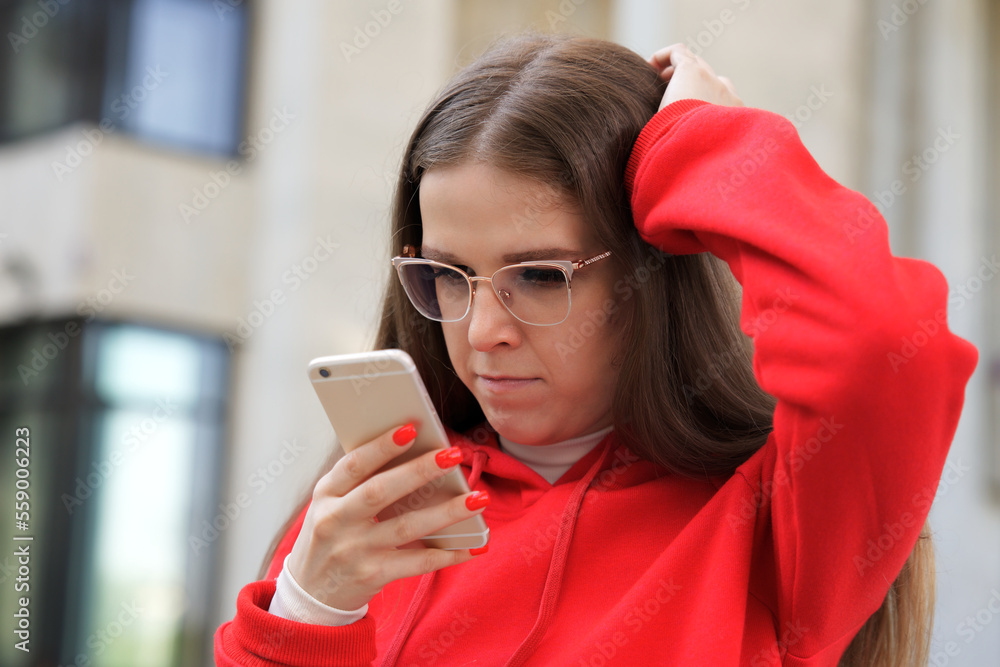 portrait of young myopic purblind student teen teenager girl looking at ...