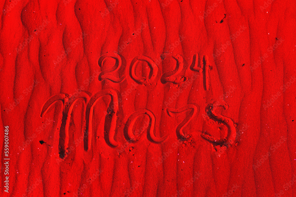 Poster The inscription 2024 Mars is written in red sand – Wall Art ...