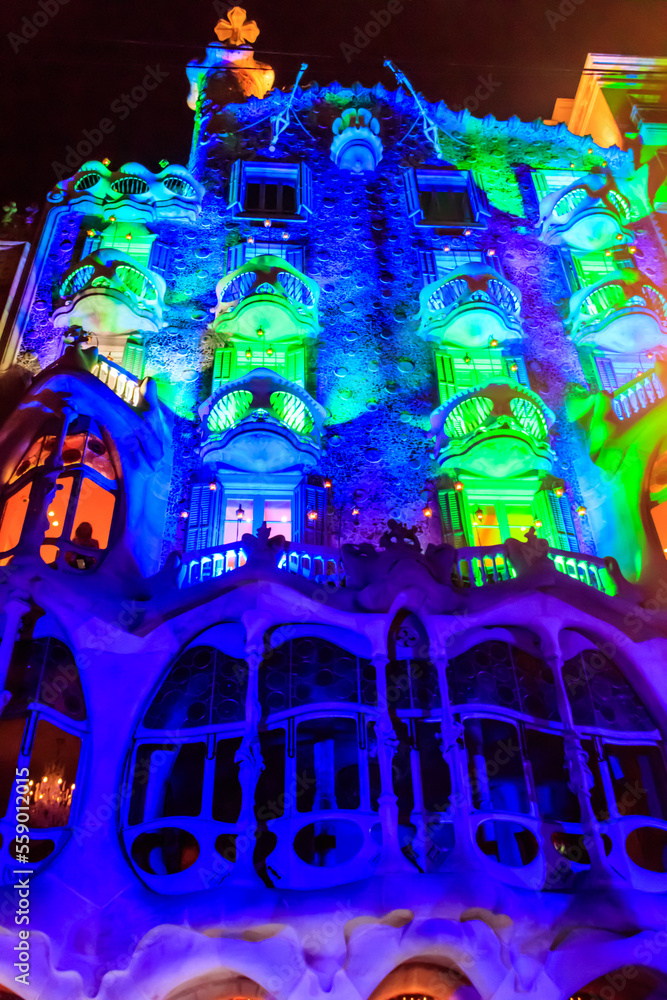 Night view of illuminated facade of the Casa Batllo designed by ...
