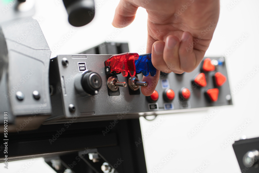 worker turning on the toggle switch up, industrial power control panel ...
