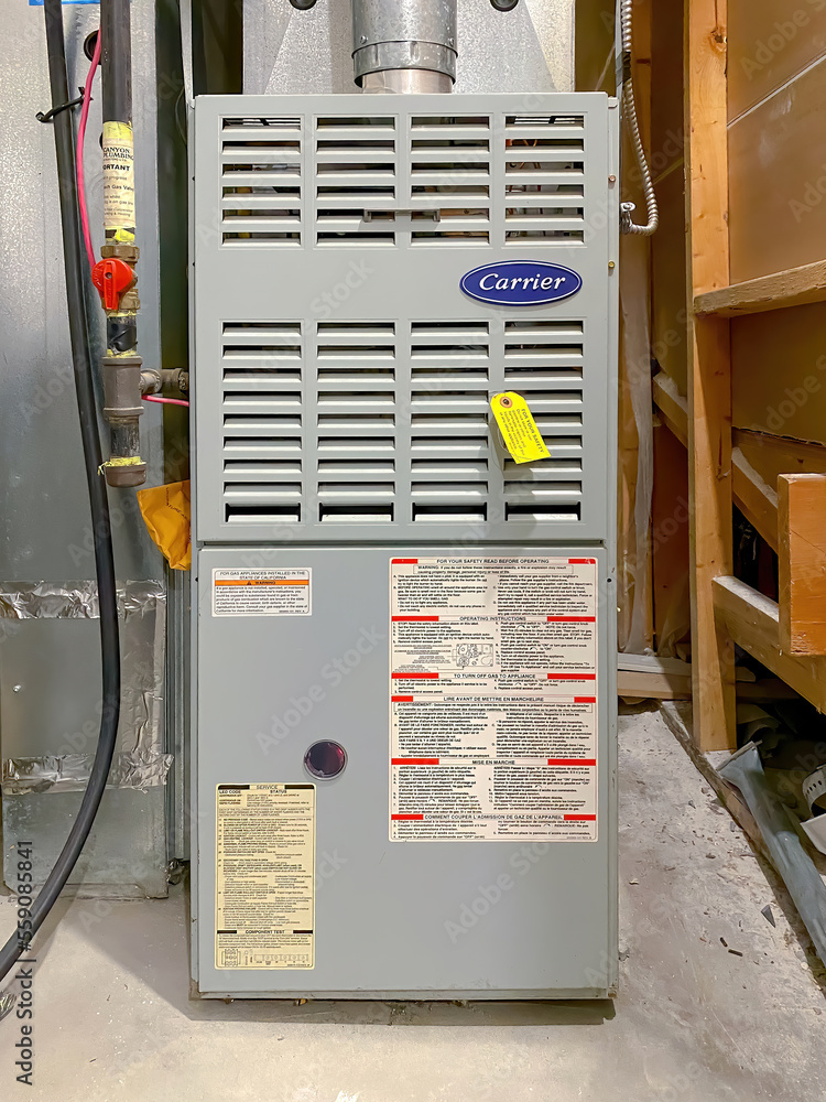 Calgary, Alberta, Canada. Jan 6, 2023. A Carrier furnace 58PAV Gas ...