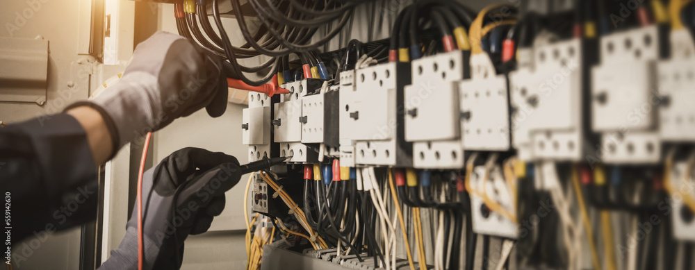 Electricity and electrical maintenance service, Engineer hand holding ...