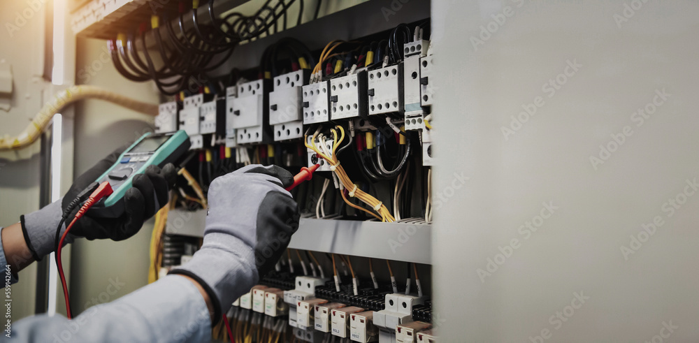 Electricity and electrical maintenance service, Engineer hand holding ...