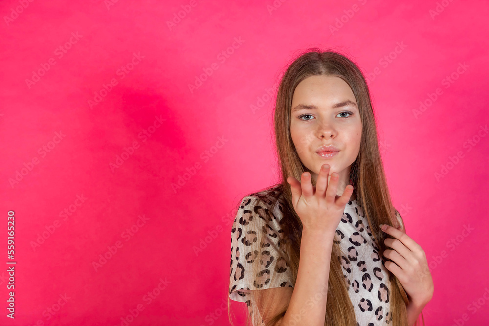 Portrait Of Teen Lovely Girl Sending Blowing Kiss With Pouty Lips At
