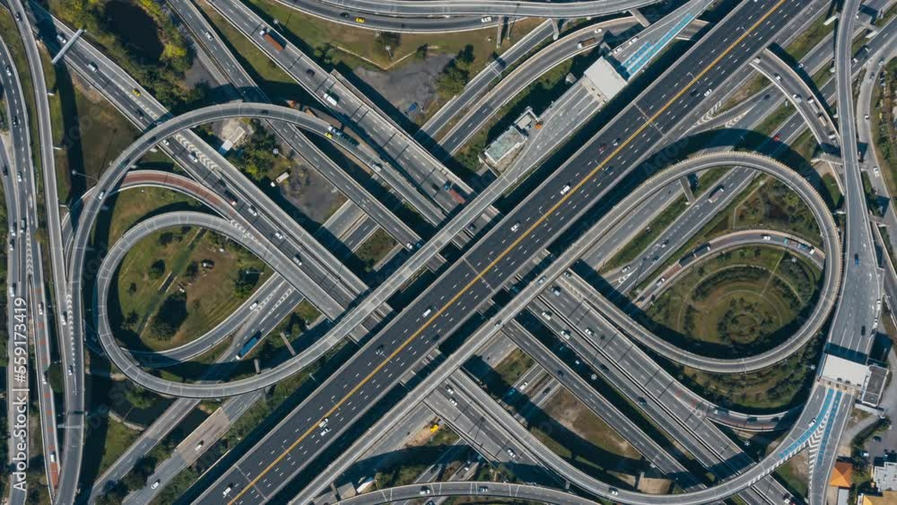 4K, Time Lapse of Multilevel junction motorway top view, Road traffic ...