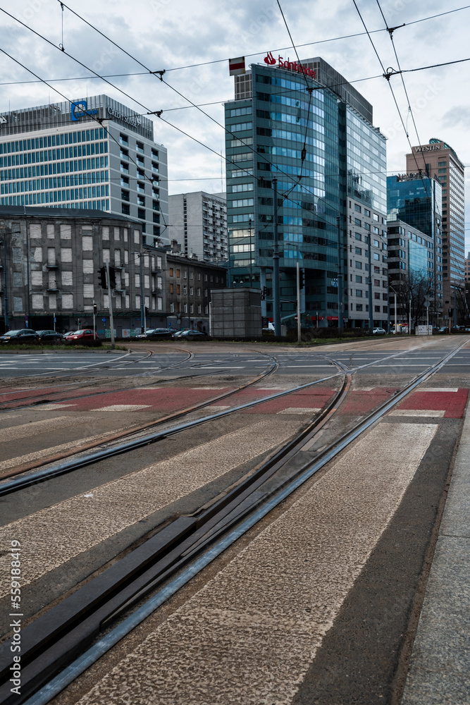 Pedestrian crossing over the road and tram track on the background of ...
