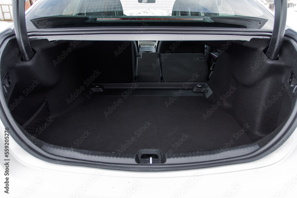 Modern sedan car open trunk. Huge, clean and empty car trunk in ...