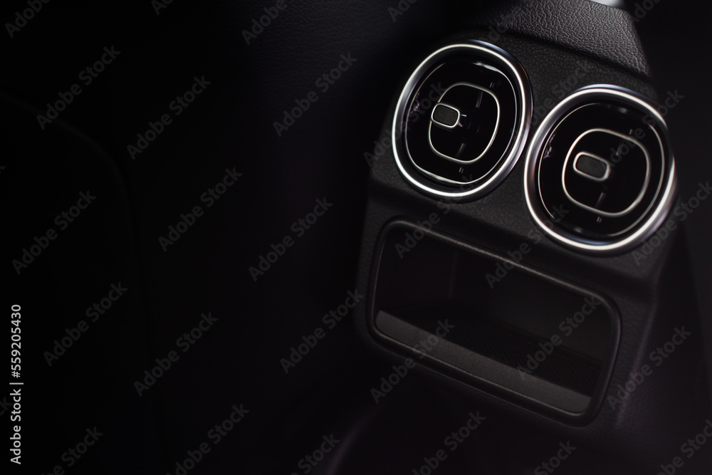 Car air conditioning close up view. The air conditioner flow inside the ...