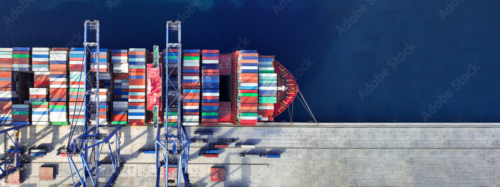 Aerial drone ultra wide top down photo of industrial cargo container ...