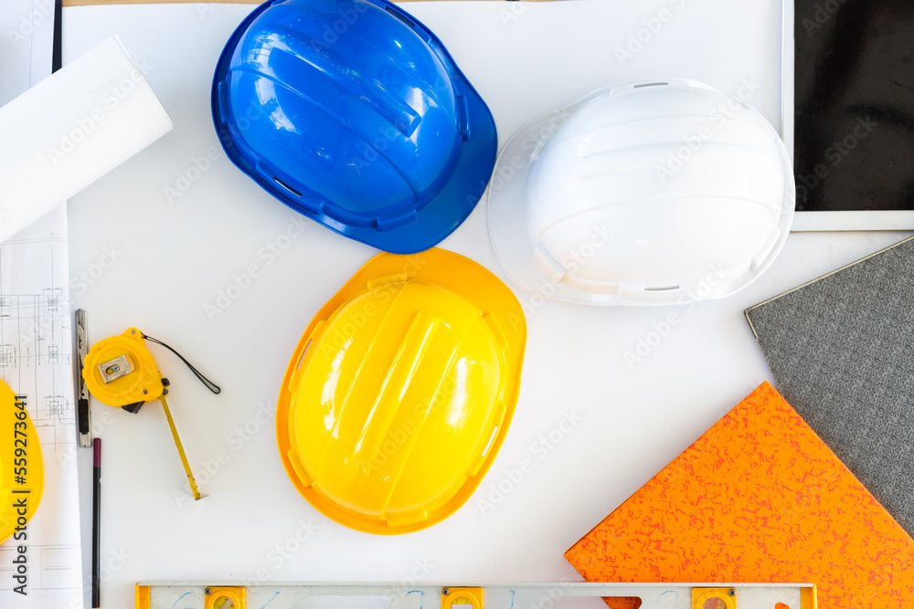 Business engineer contractor concept, Hard helmet and blue print ...