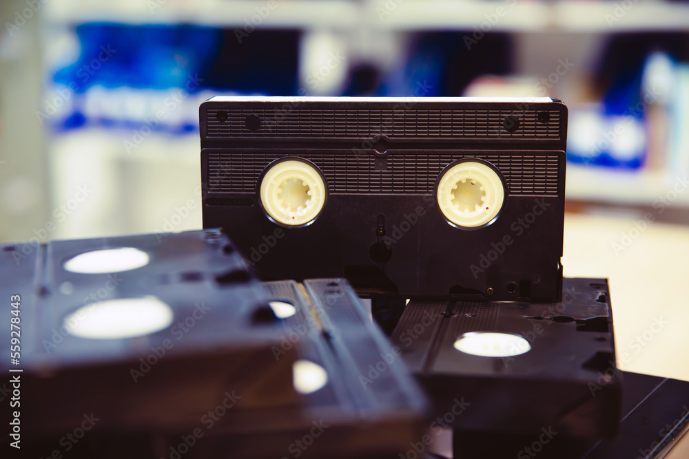 Pile of video cassette tape VHS on video playback stack concept of old ...