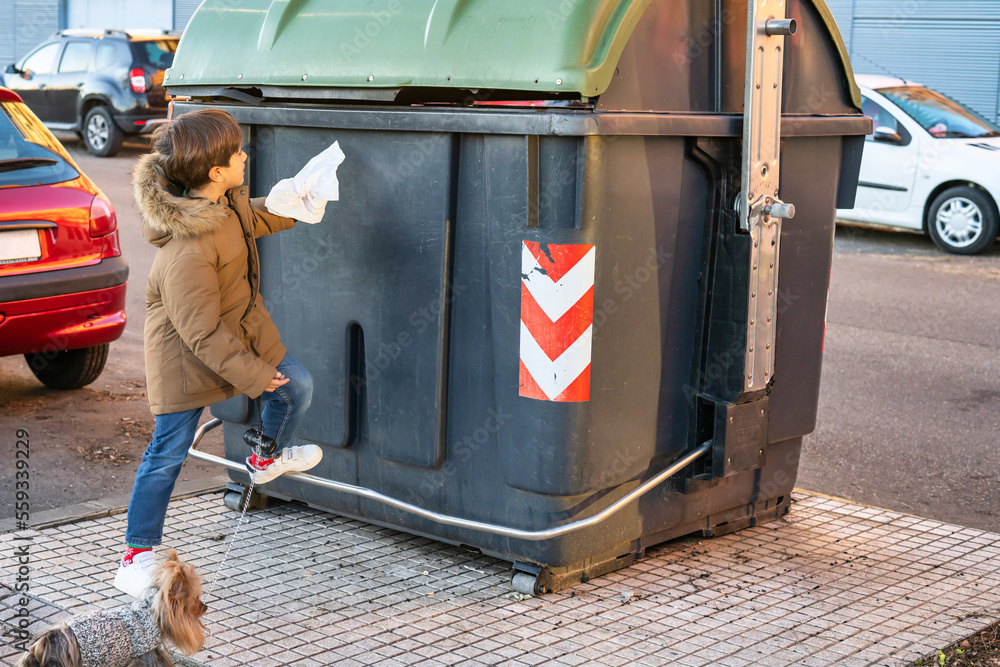 Responsible Toddler Who Throws His Pet's Droppings Into The Garbage ...