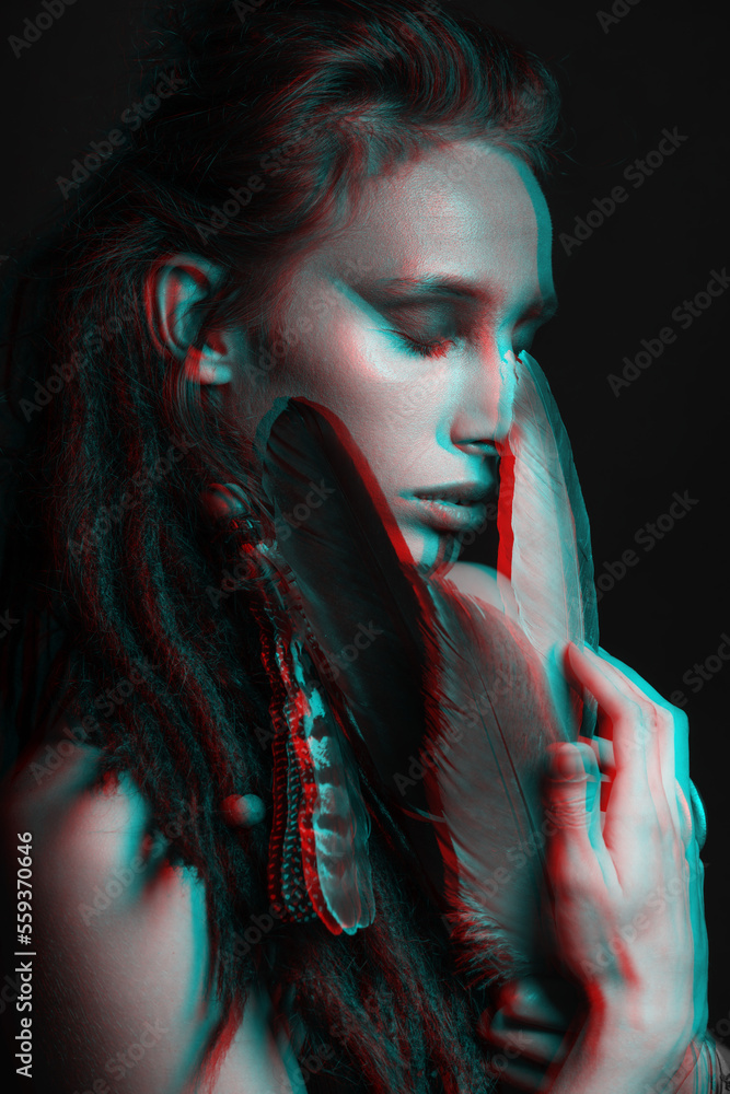 Beautiful woman studio portrait in red and blue color split effect ...