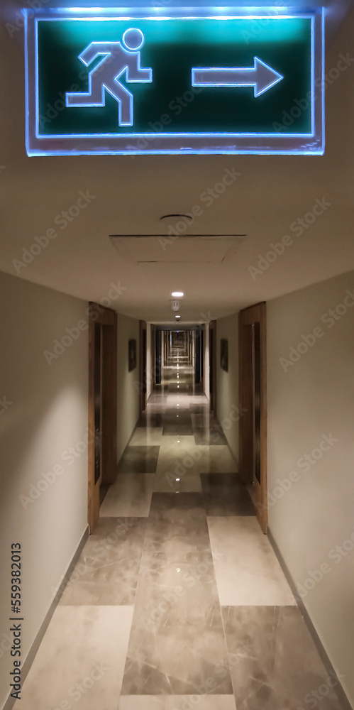 Emergency exit sign. Interior internal corridor of modern office or ...
