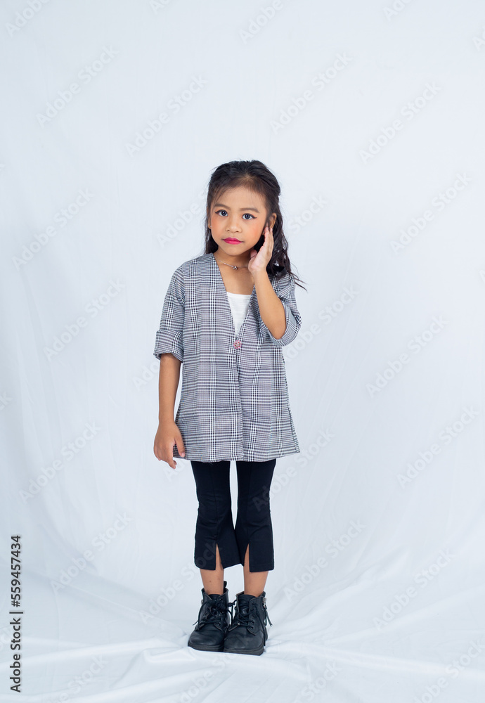 Kid model girl posing in studio background. 5 years old asian kid hand ...