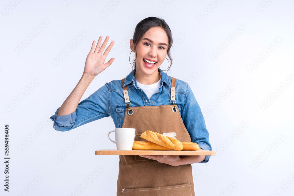 young asian waitress barista wearing apron hand hold bread and coffee ...