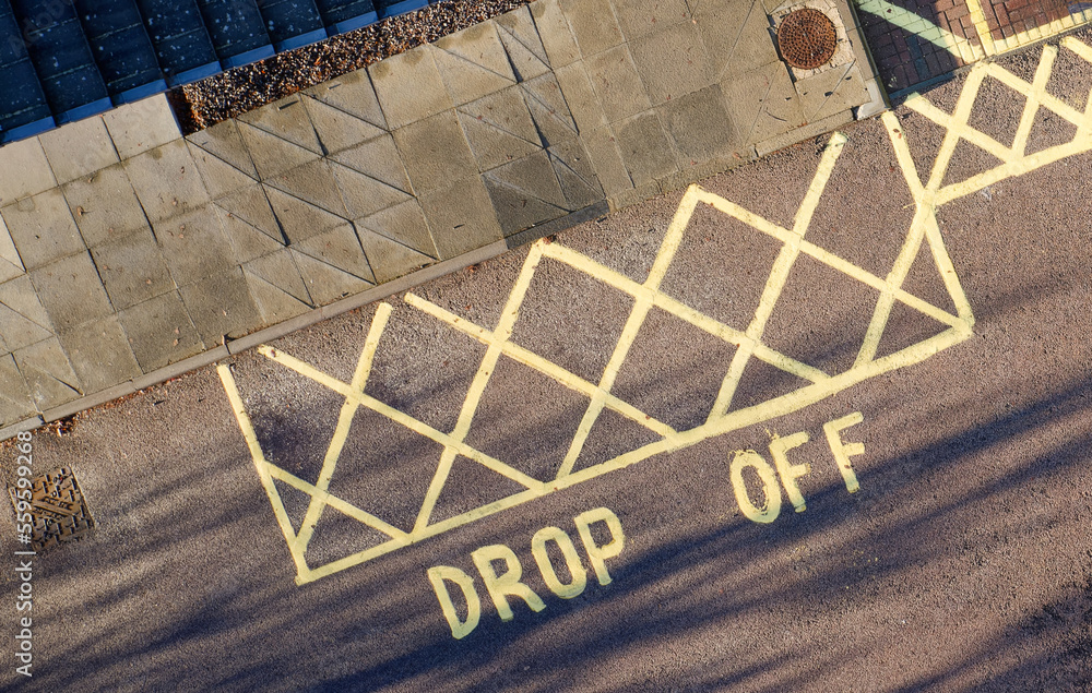 Drop off sign marking at parking space at school entrance Stock Photo ...