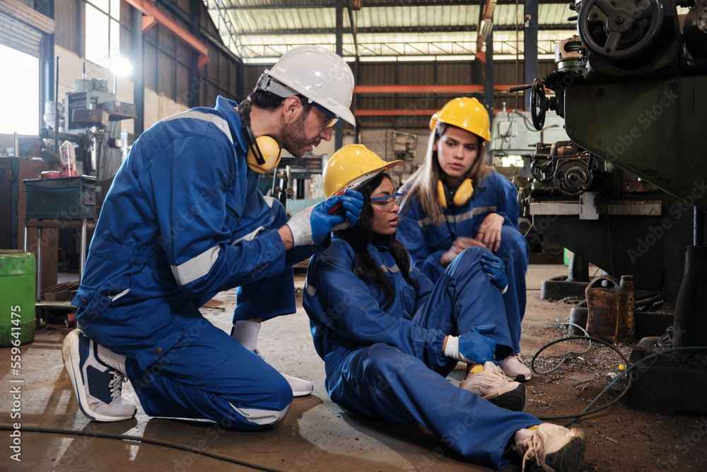 Painful accident in industrial production metalwork, African American ...