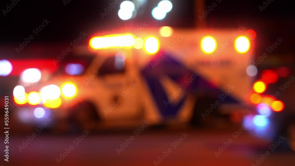 Ambulance at night with flashing lights slow motion. Paramedics car at ...