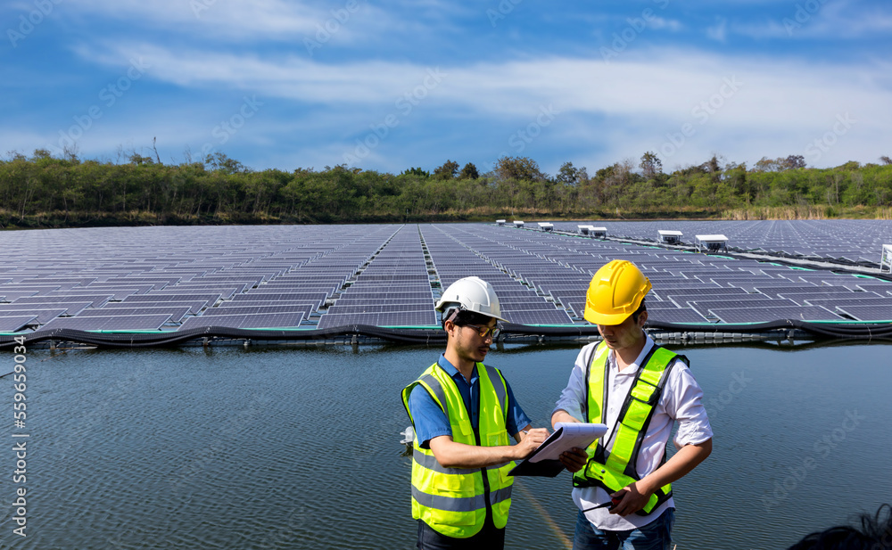 Engineer working setup Floating solar panels or solar cell Platform ...