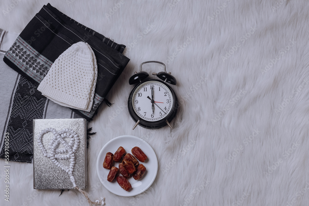Islamic background with copy space, muslim prayer equipment with alarm ...