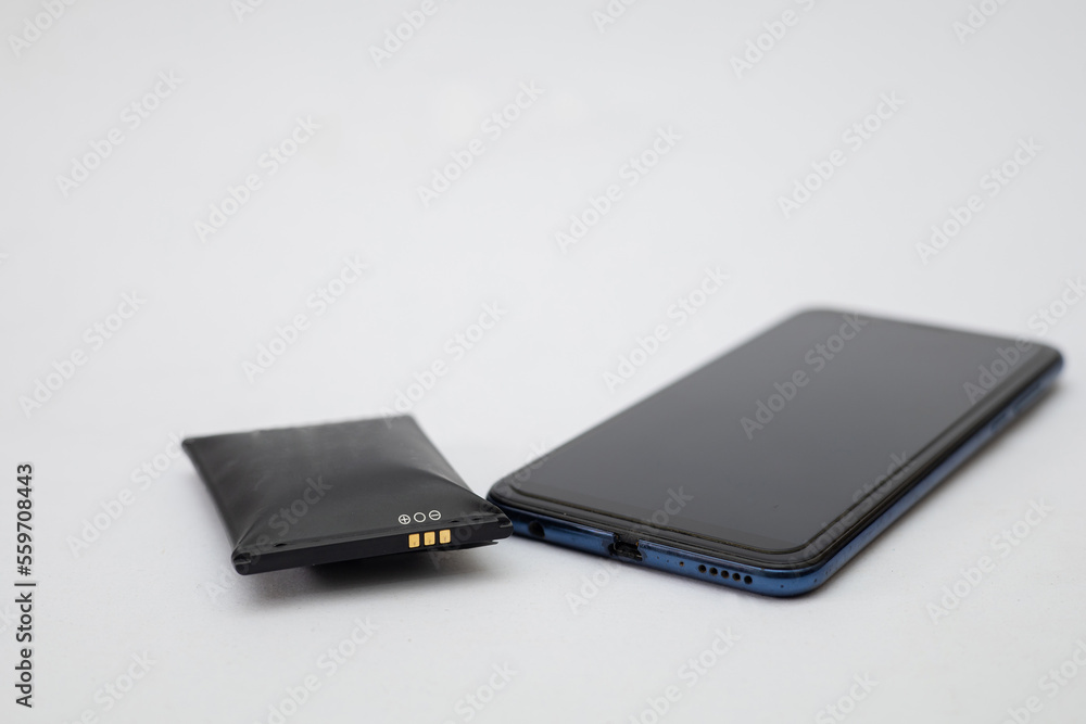 Mobile phone battery, smartphone, swelling, damage, white background ...
