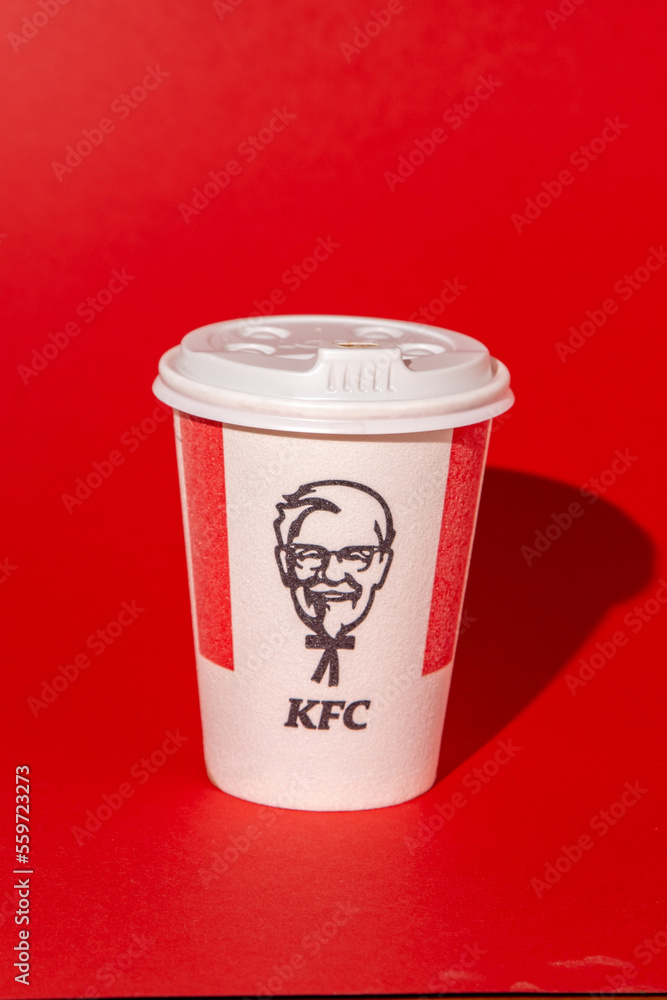 Red white glass of KFC for coffee, cocoa, tea on a red background. Hot ...