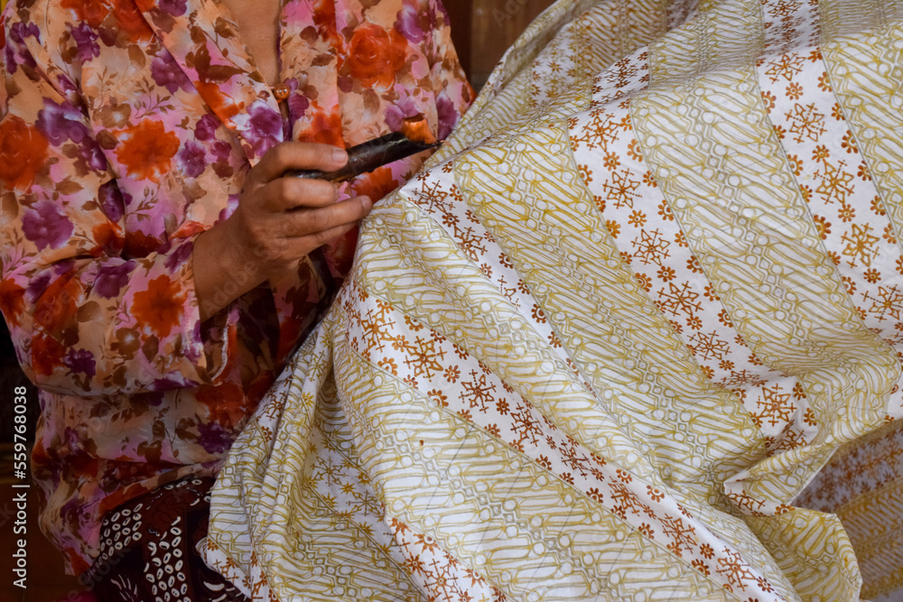 The process of making Batik on Kraton Yogyakarta. Batik is Indonesia's ...