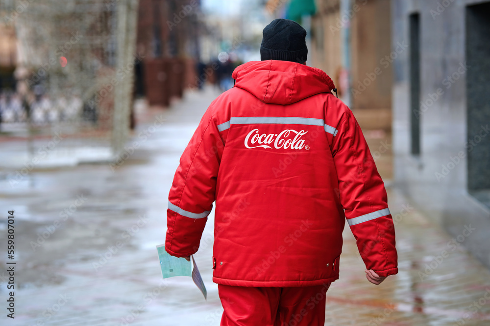 Minsk, Belarus. Dec 2022. Coca-cola worker, deliveryman from the Coca ... Minsk, Belarus. Dec 2022. Coca-cola worker, deliveryman from the Coca ...
