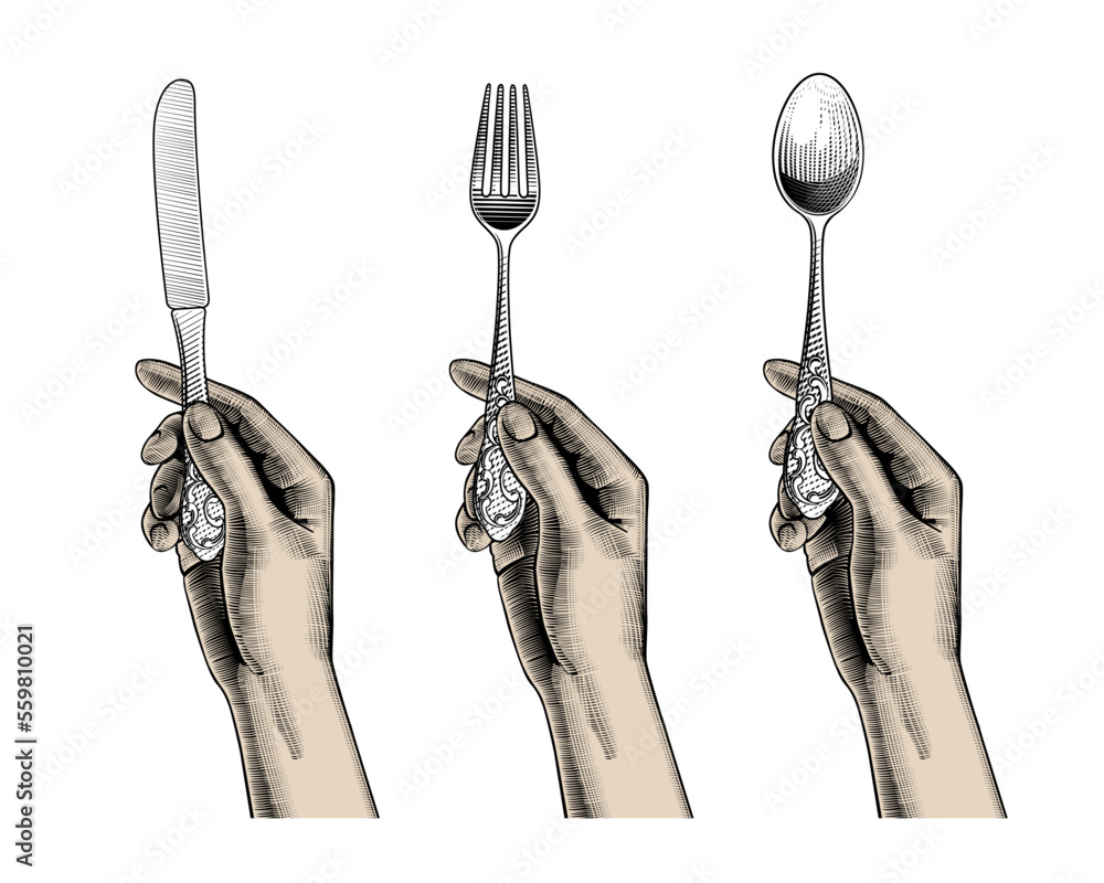 Engraved female hands holding cutlery are holding a table knife, a ...