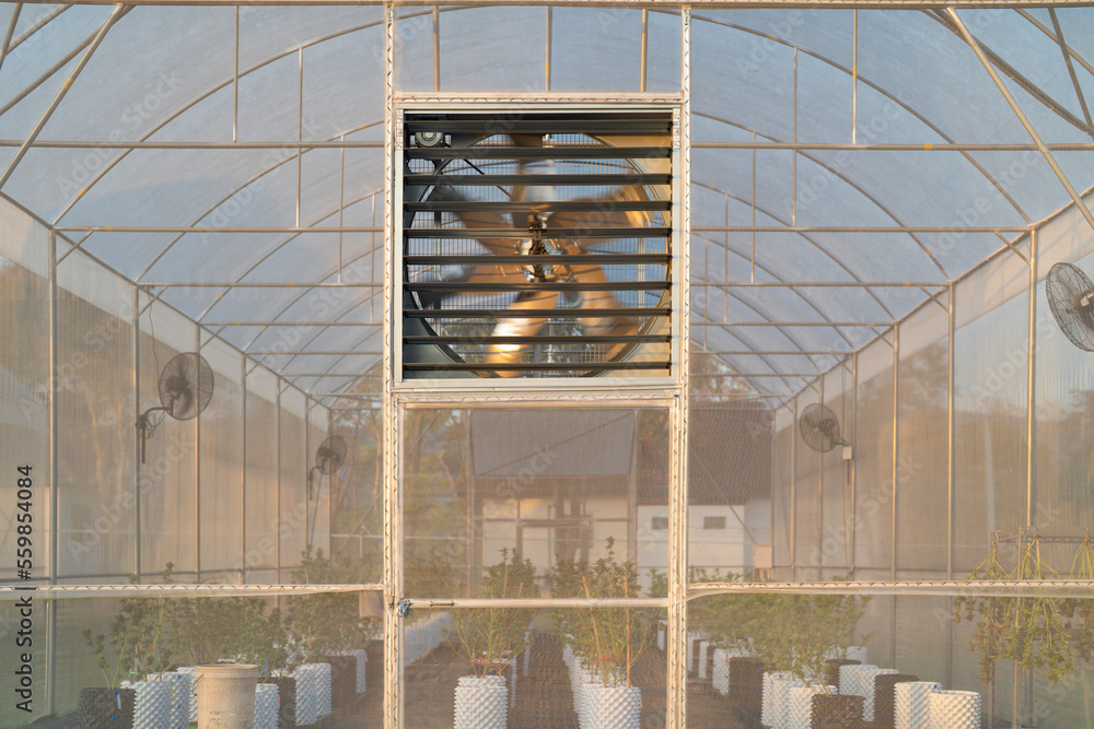 Modern mounted cassette type air conditioner fan in farm. Outdoor ...