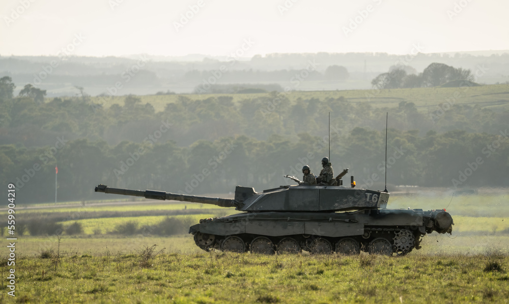 commander and gunner directing action in a British army FV4034 ...